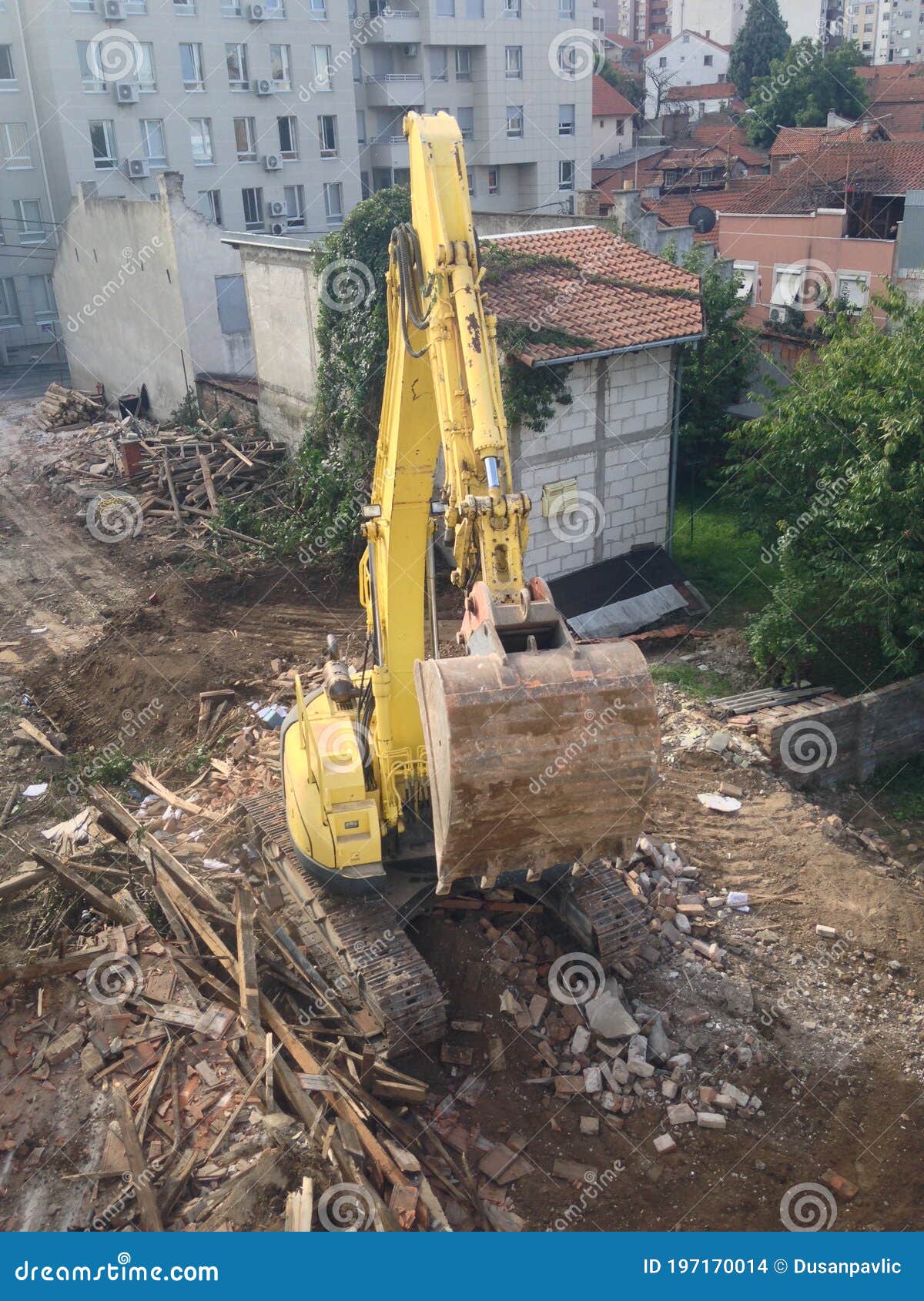 Construction Machine with a Spoon Digs a Hole Stock Photo - Image of ...