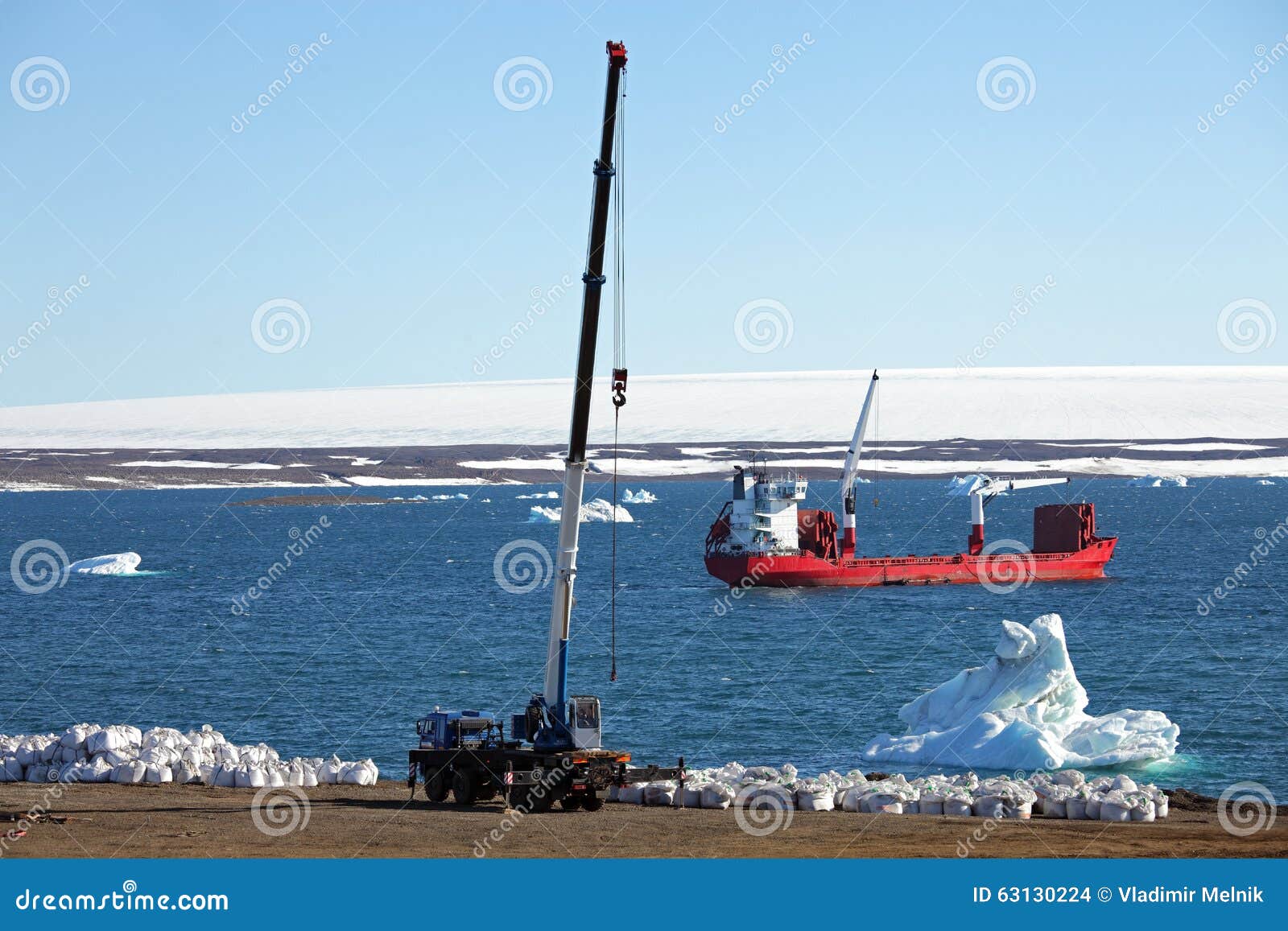 Construction Machinery and Ship in Arctic Stock Photo - Image of load ...