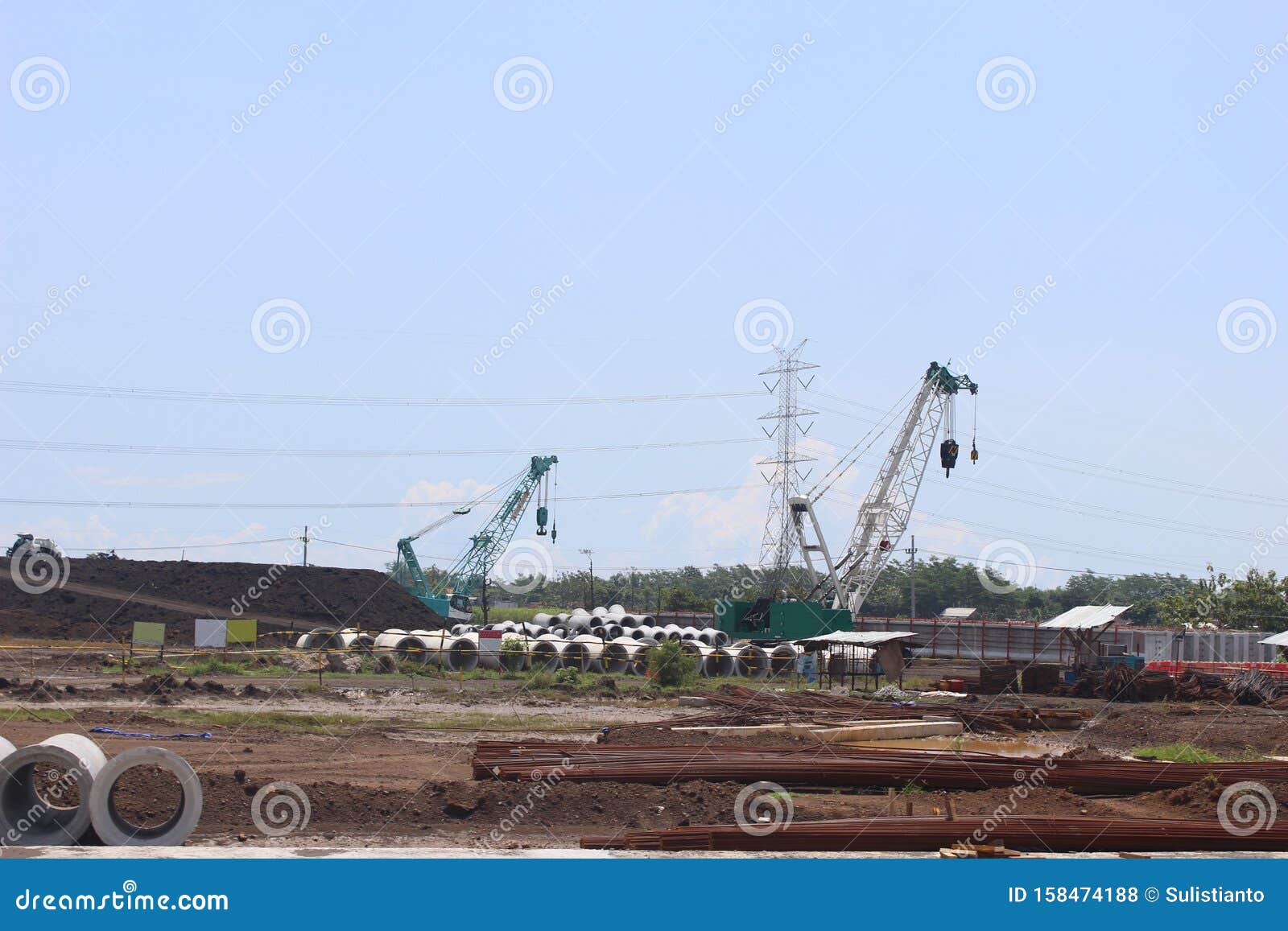 Crane Construction Machinery is Working on Road Projects and Building ...