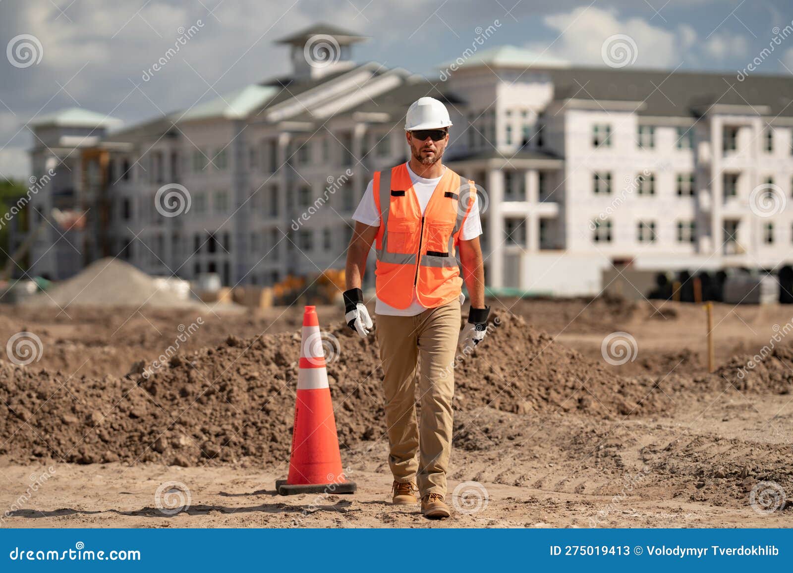 Construction Man with Helmet. Worker at Construction New Building ...