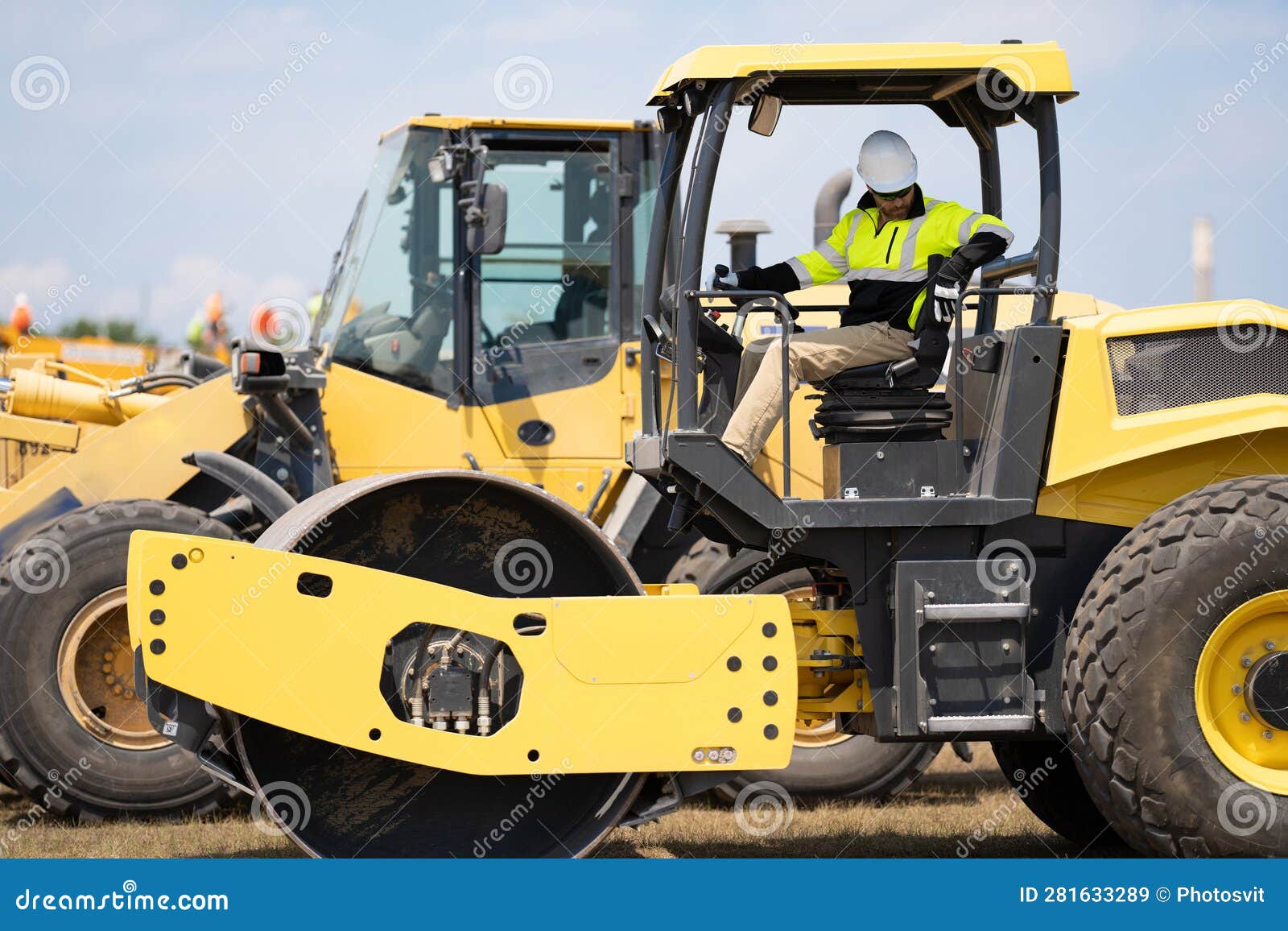 Construction Man Worker at Construction Heavy Machinery or Roadwork ...