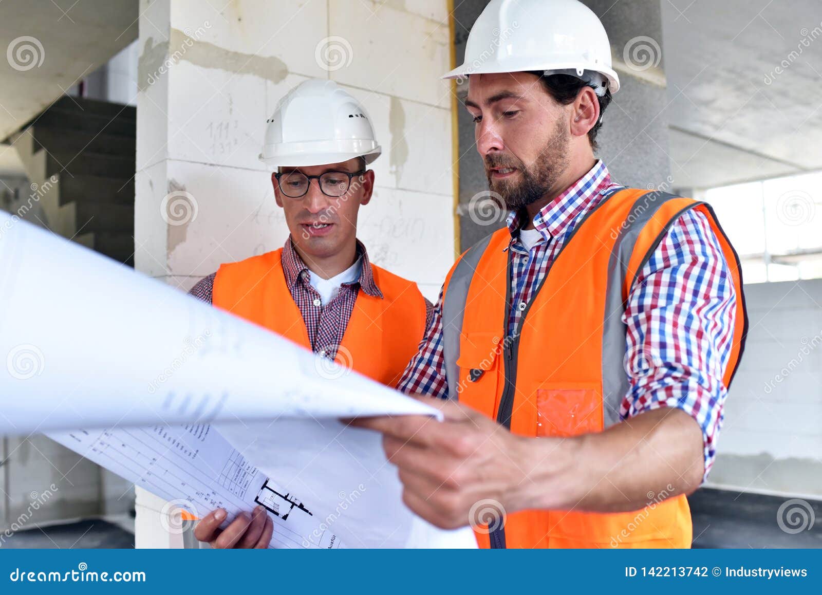 Construction Manager and Architect on Site during the Construction of a ...