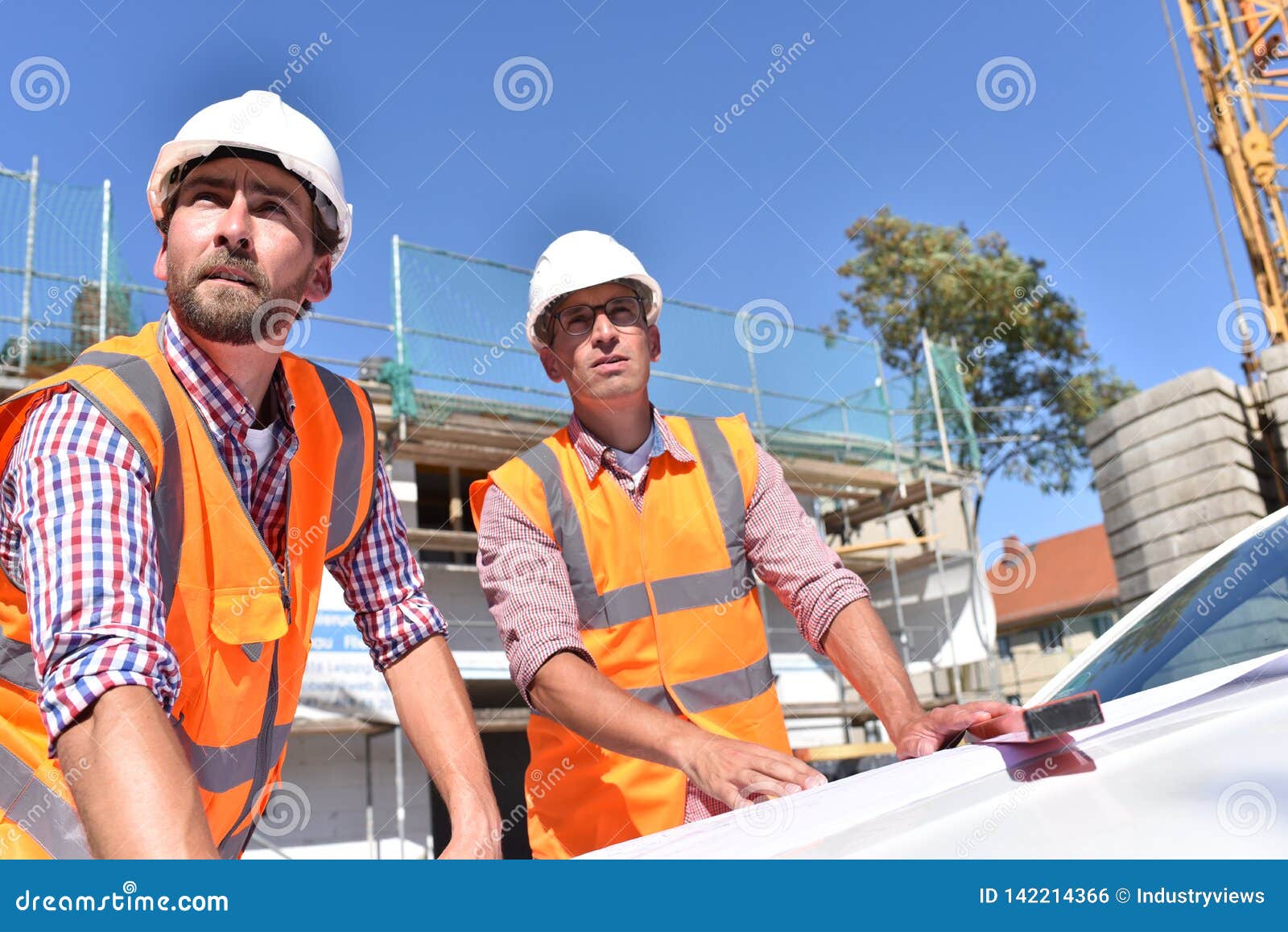 Construction Manager and Architect on Site during the Construction of a ...