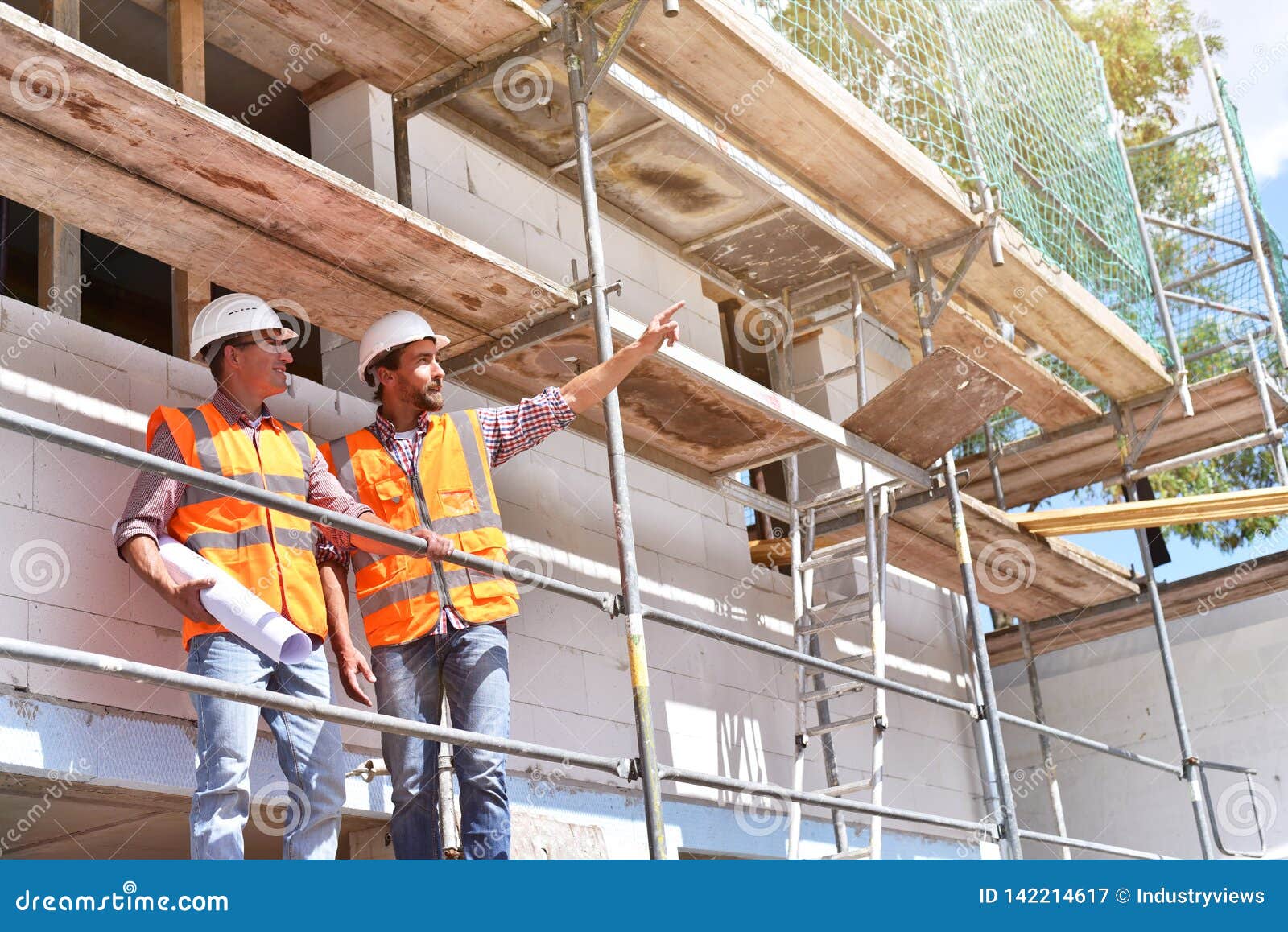 Construction Manager and Architect on Site during the Construction of a ...