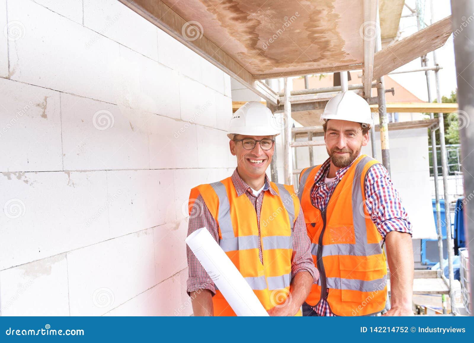 Construction Manager and Architect on Site during the Construction of a ...
