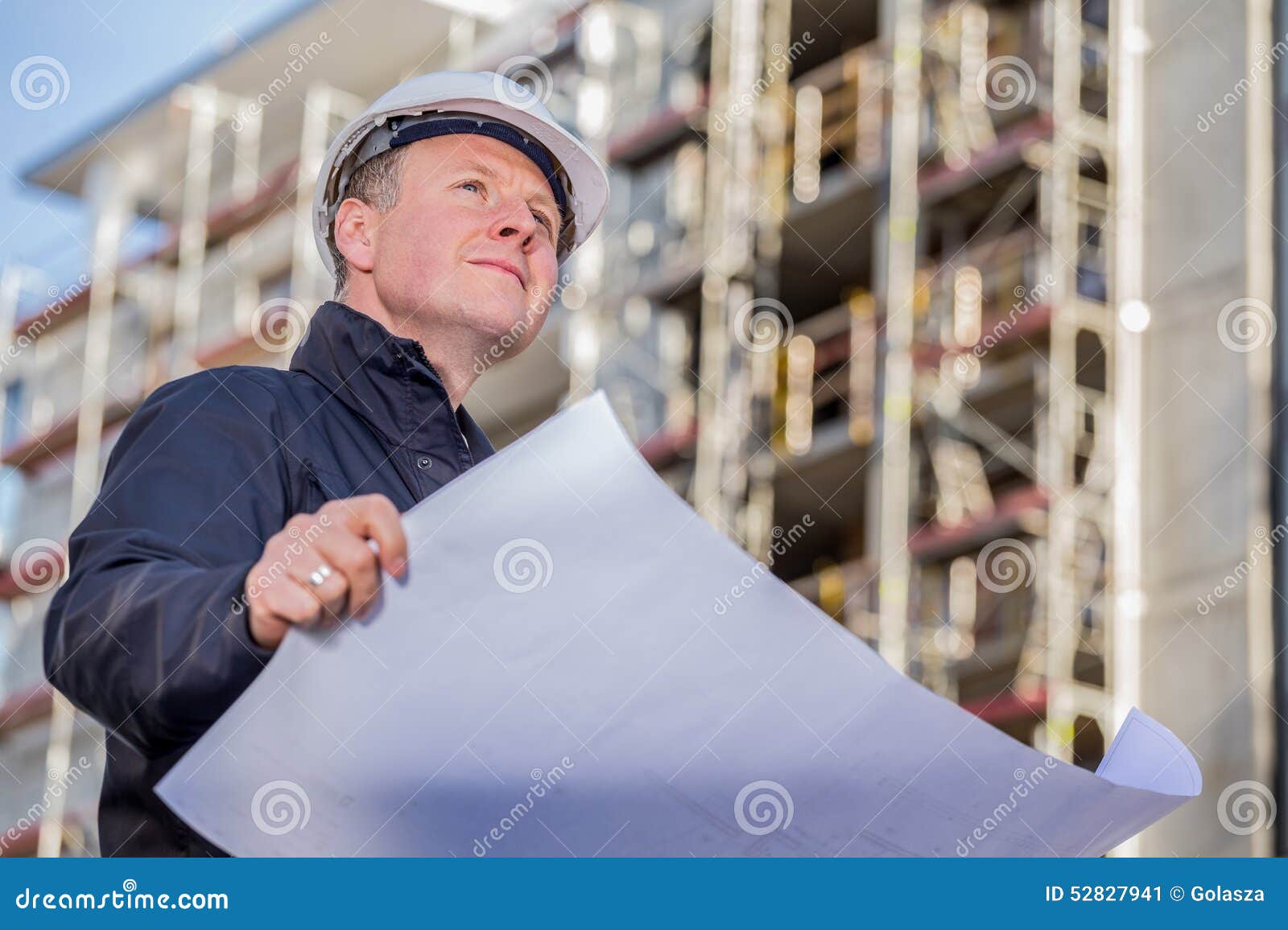 Construction Manager with Blueprints Stock Image - Image of penthouse ...