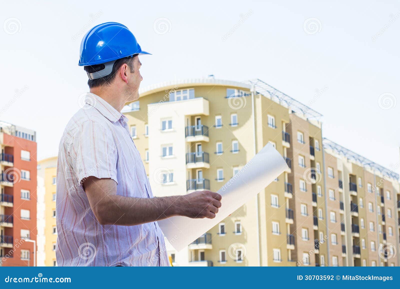 Construction Manager Holding Project Stock Photo - Image of building ...