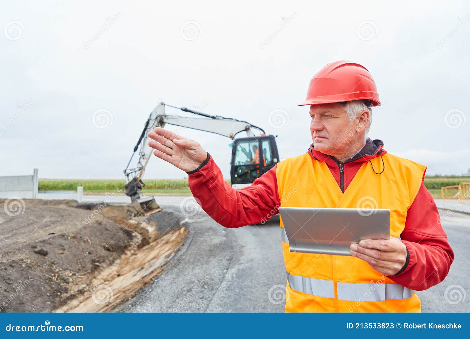 Construction Manager with Tablet Computer during Construction Planning ...