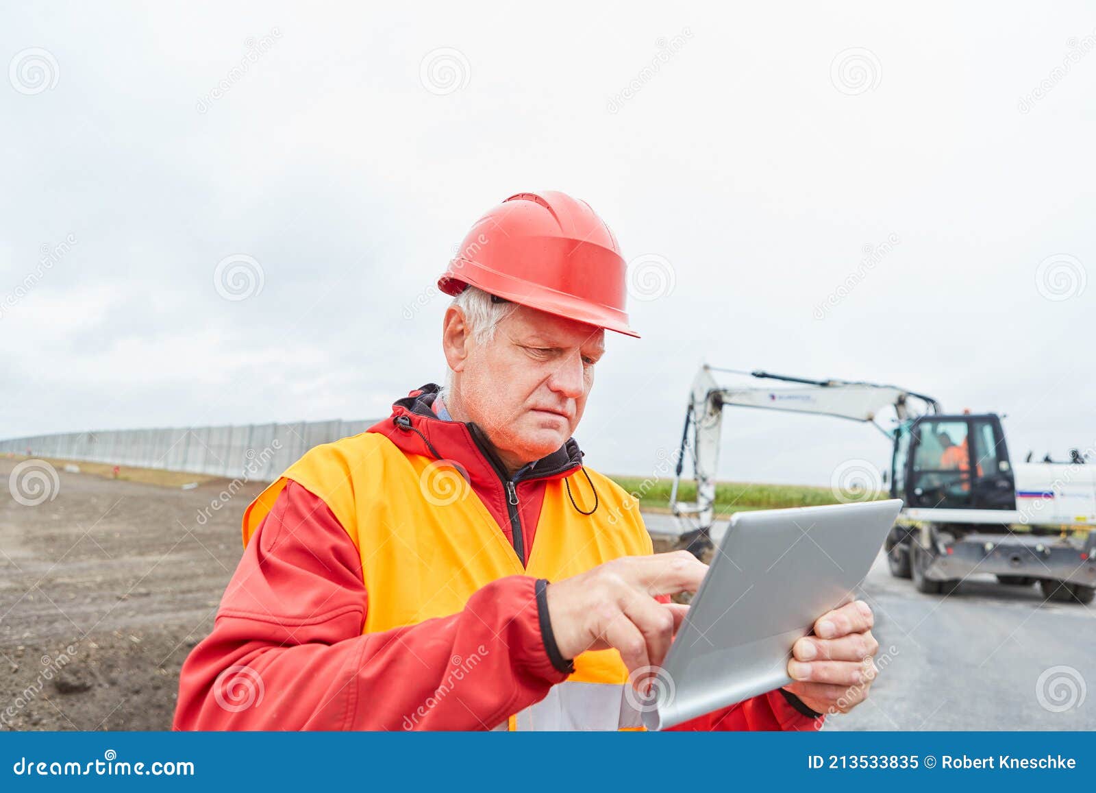 Construction Manager Using Tablet Computer on Construction Site Stock ...
