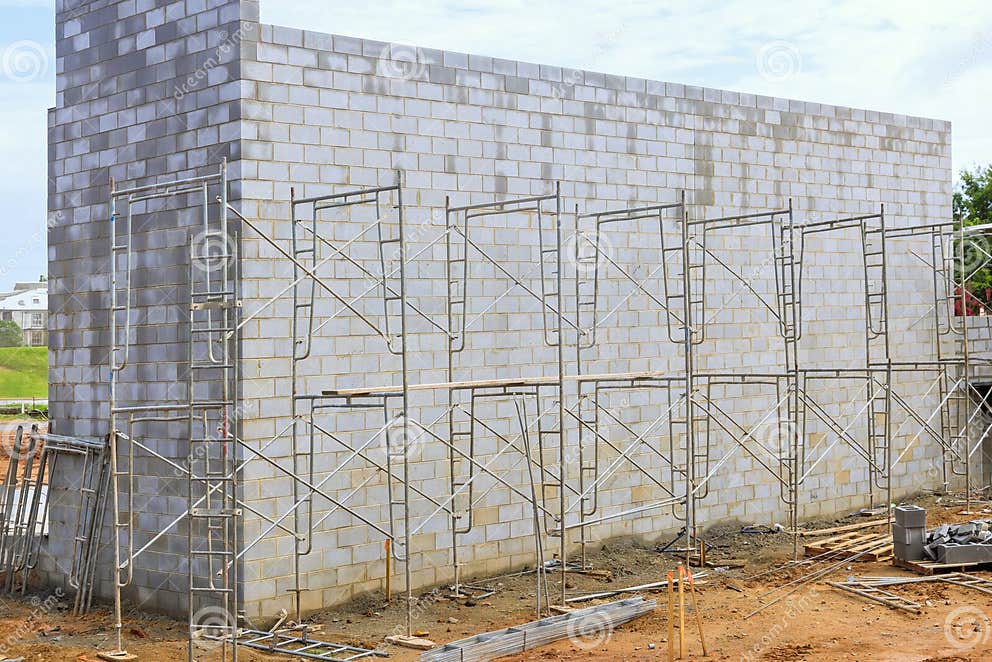 During Construction, Mason Makes Concrete Wall from Cement Blocks while ...
