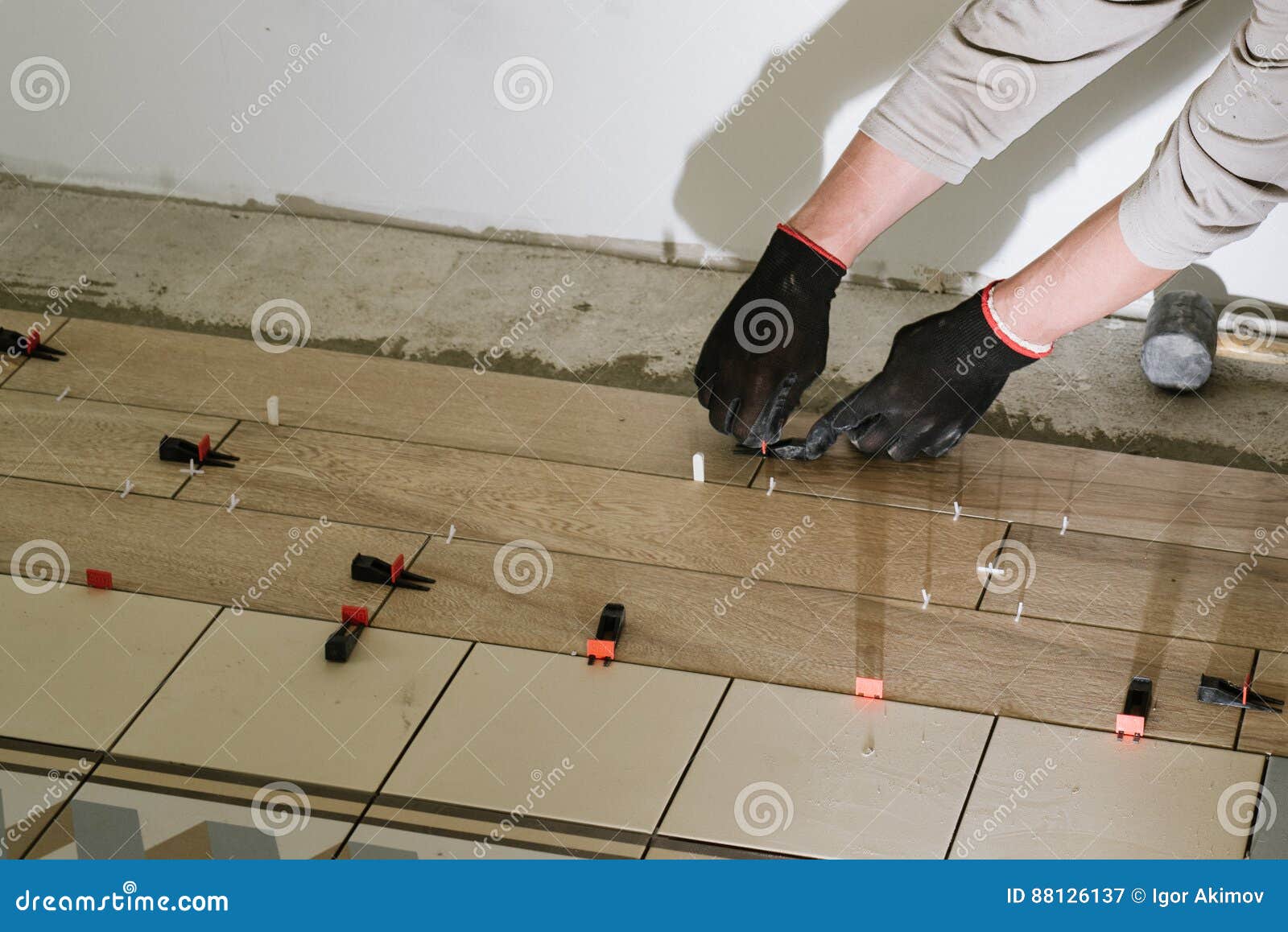 Construction Mason Man Hands On Tiles Work With Cement Mortar Royalty ...