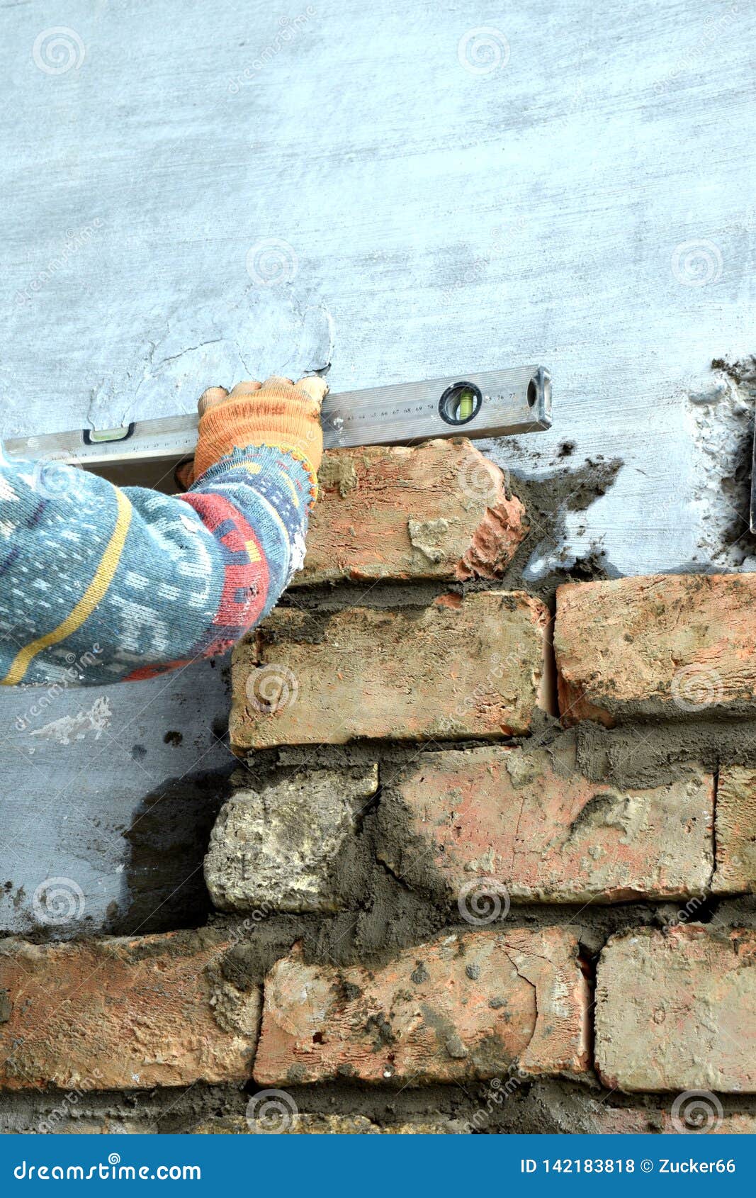 Construction mason at work stock photo. Image of people - 142183818