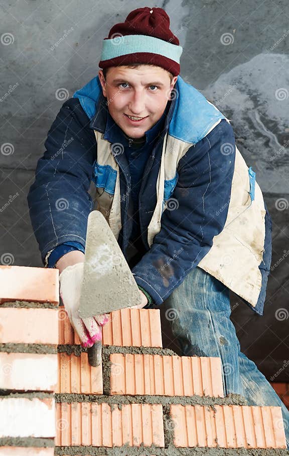 Construction mason worker stock photo. Image of checking - 13149956