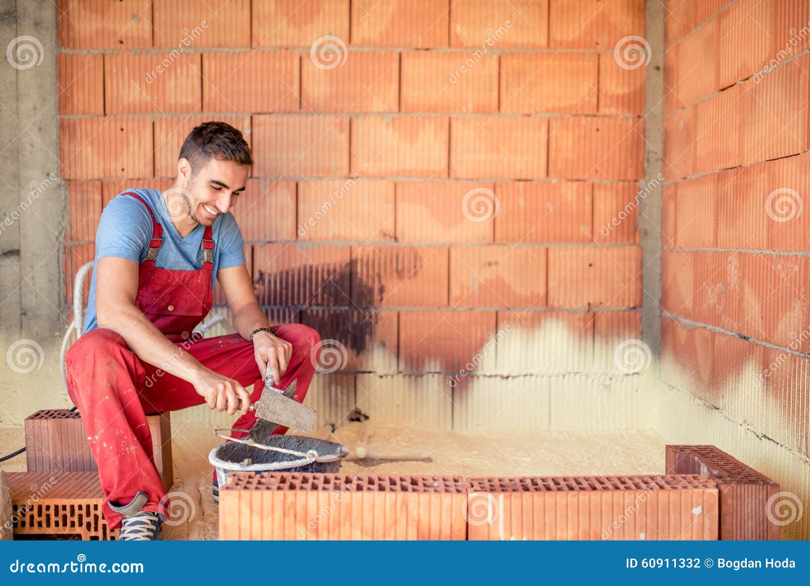 Construction Mason Worker, Bricklayer Building Brick Walls with Spatula ...