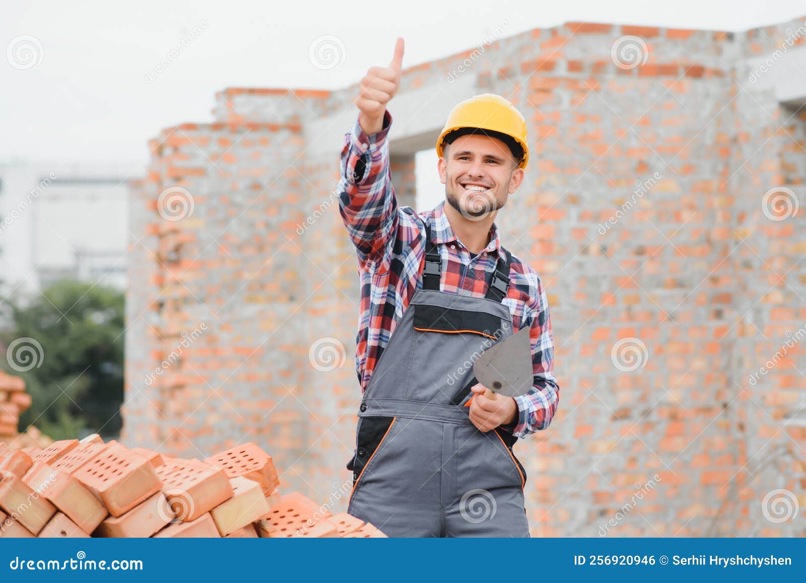 Construction Mason Worker Bricklayer Installing Red Brick with Trowel ...