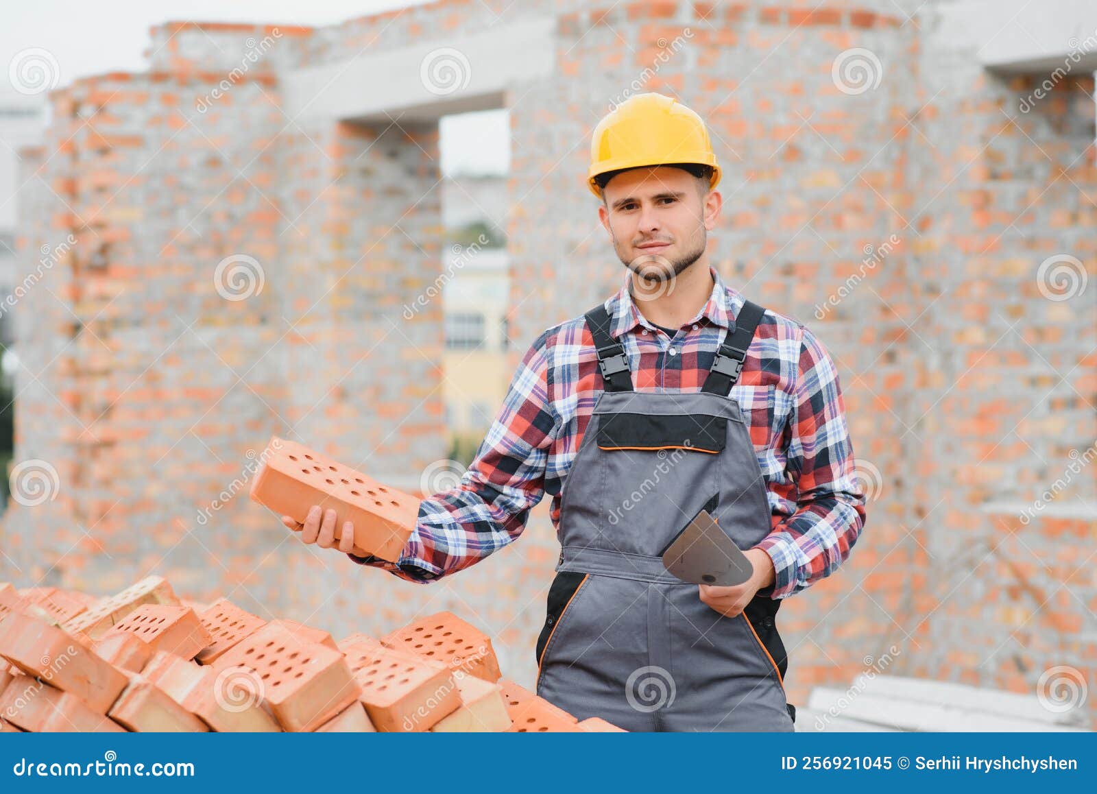 Construction Mason Worker Bricklayer Installing Red Brick with Trowel ...
