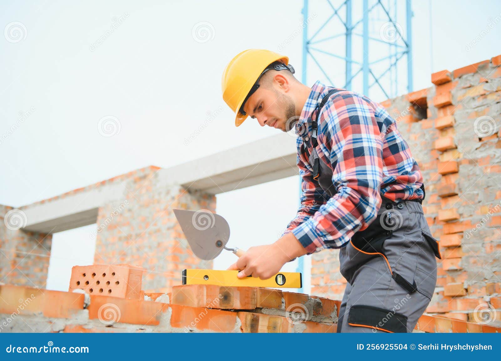 Construction Mason Worker Bricklayer Installing Red Brick with Trowel ...