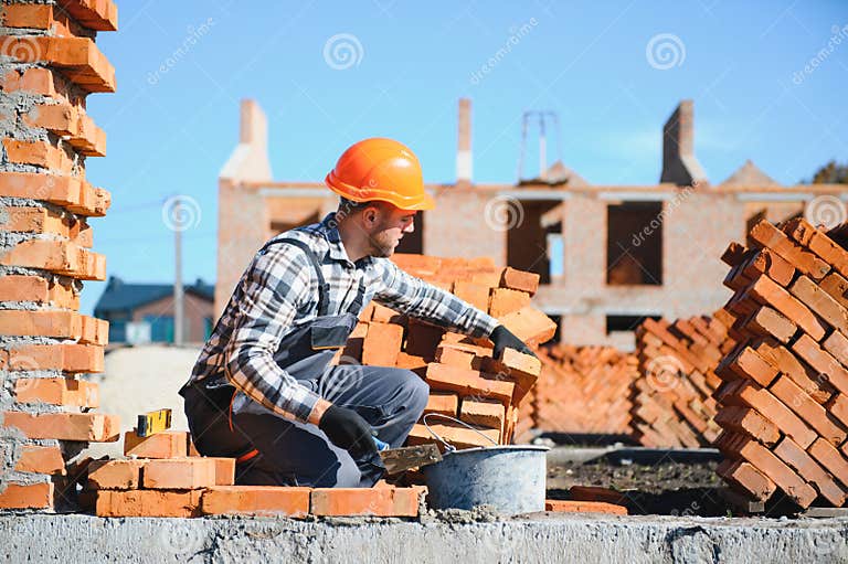 Construction Mason Worker Bricklayer Installing Red Brick with Trowel ...