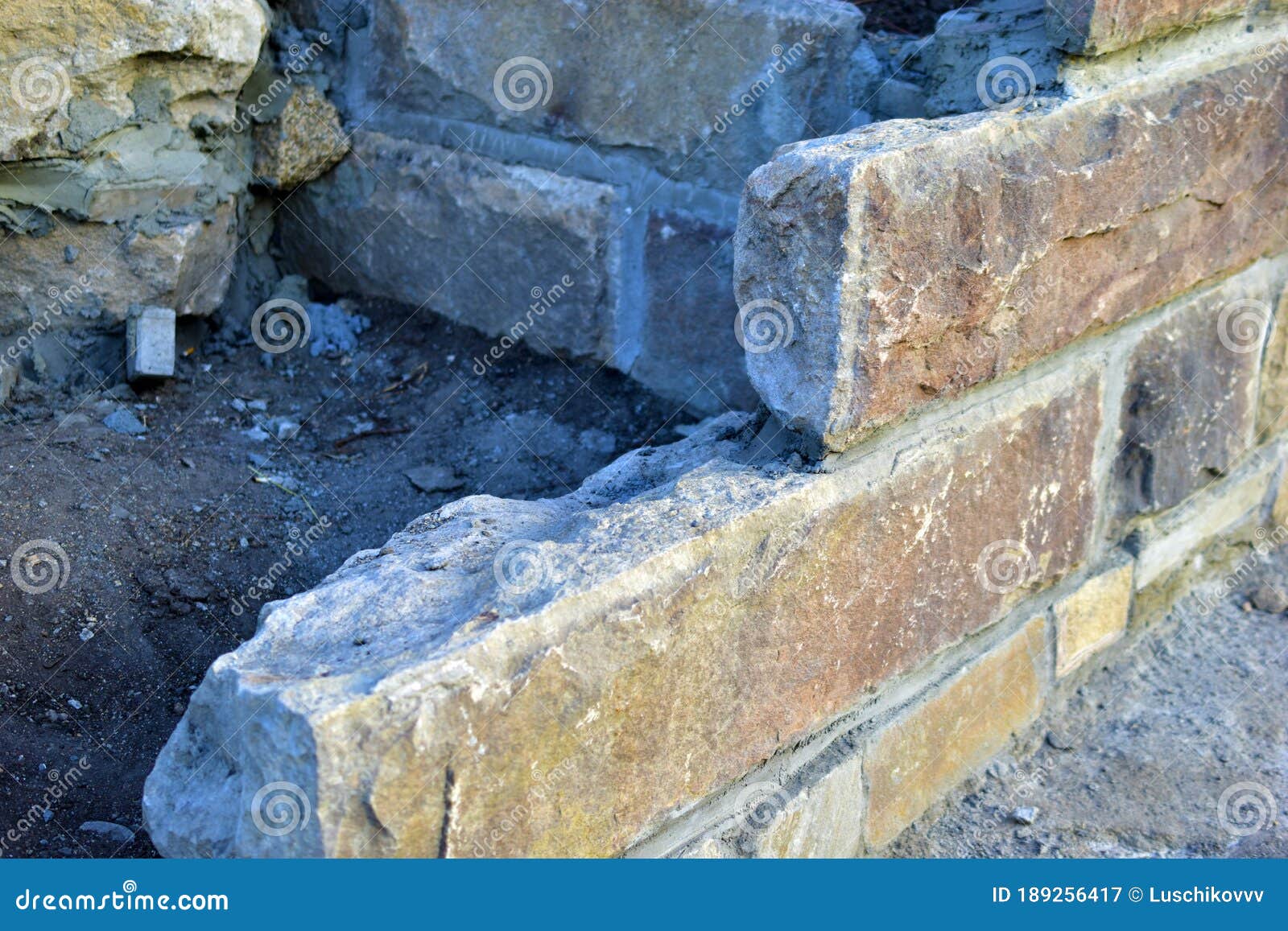 Construction Masonry of Rough Stones in the House and Fence Stock Image ...