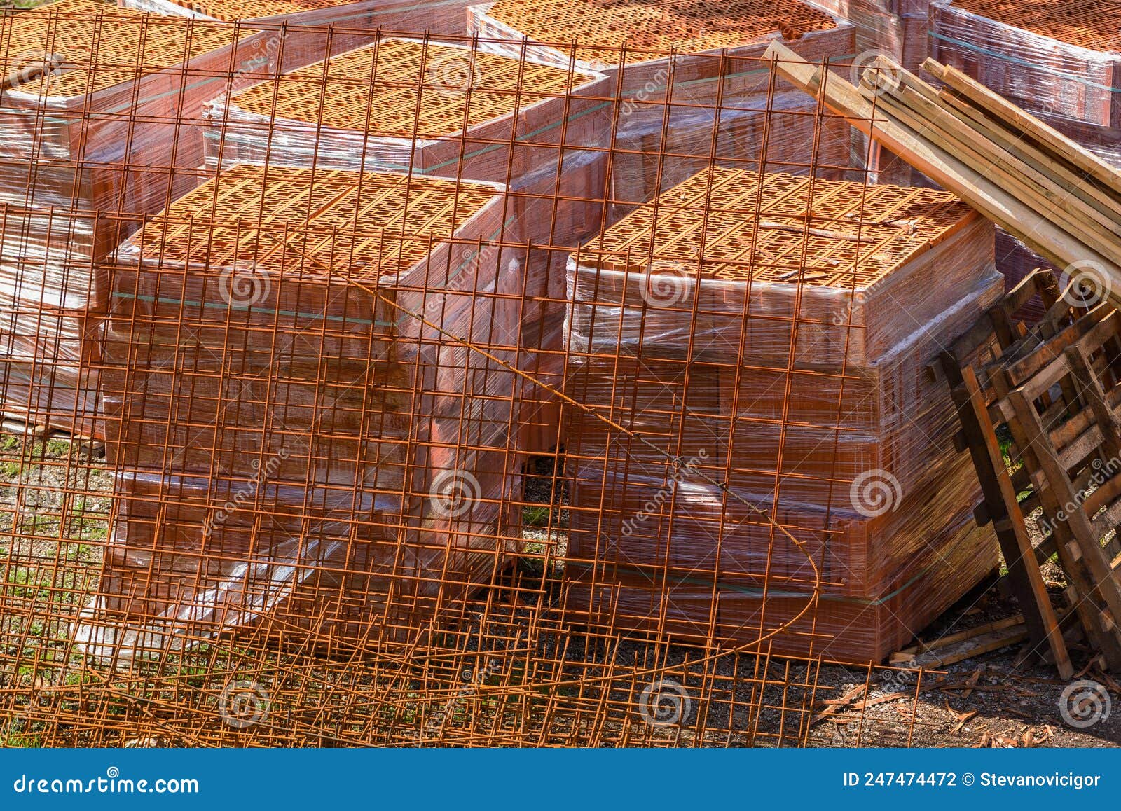 Construction Material on Building Site - Planks, Blocks and Roof Tiles ...