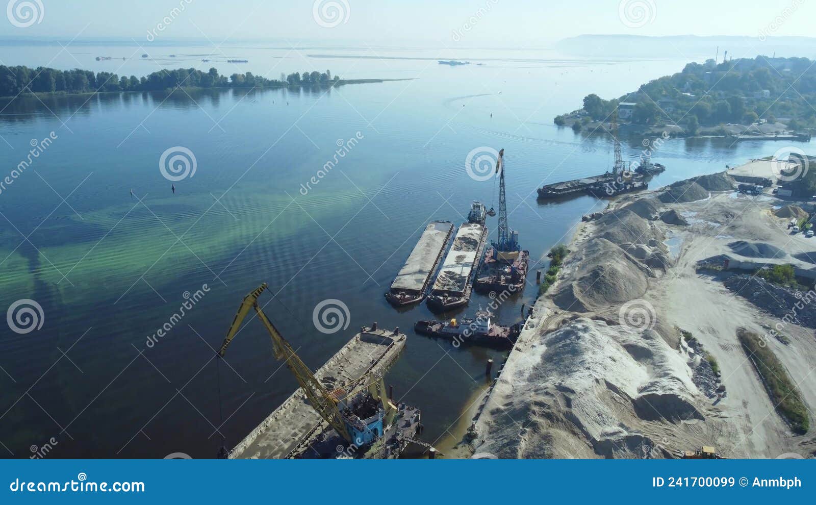 Sand Warehouse and Floating Cranes during Barges Unloading, Aerial View ...