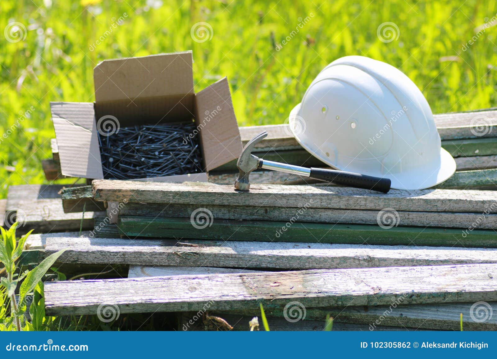 Construction Materials on the Grass Stock Photo - Image of construct ...