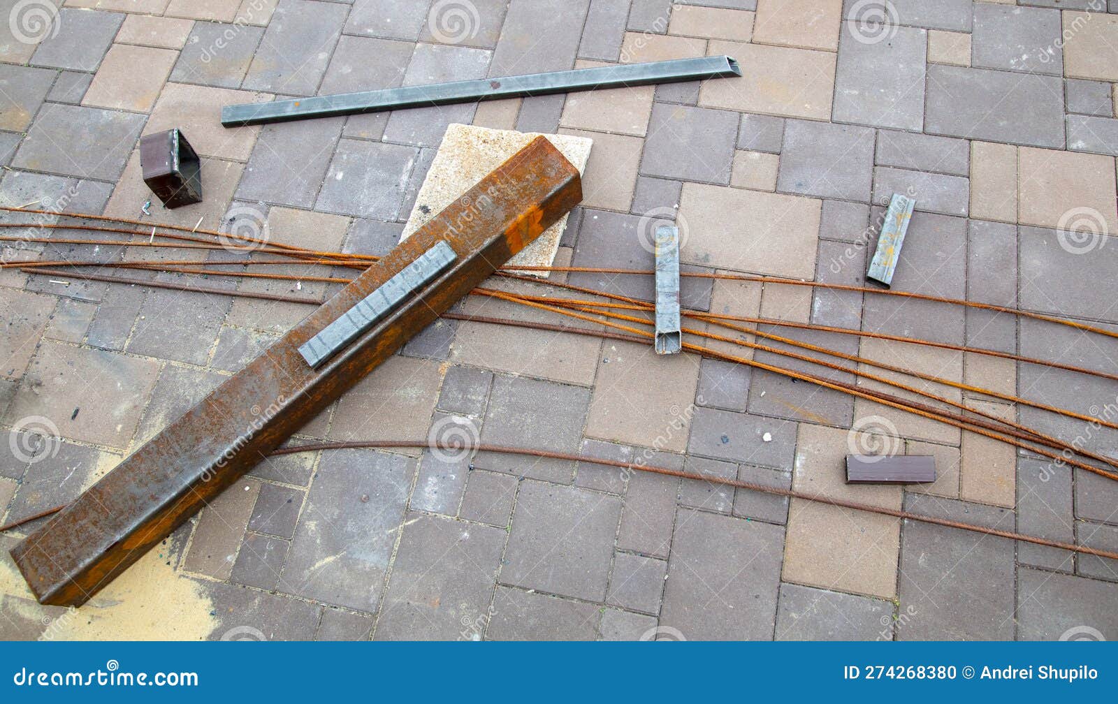 Construction Metal on Paving Slabs. Stock Photo - Image of curbs ...