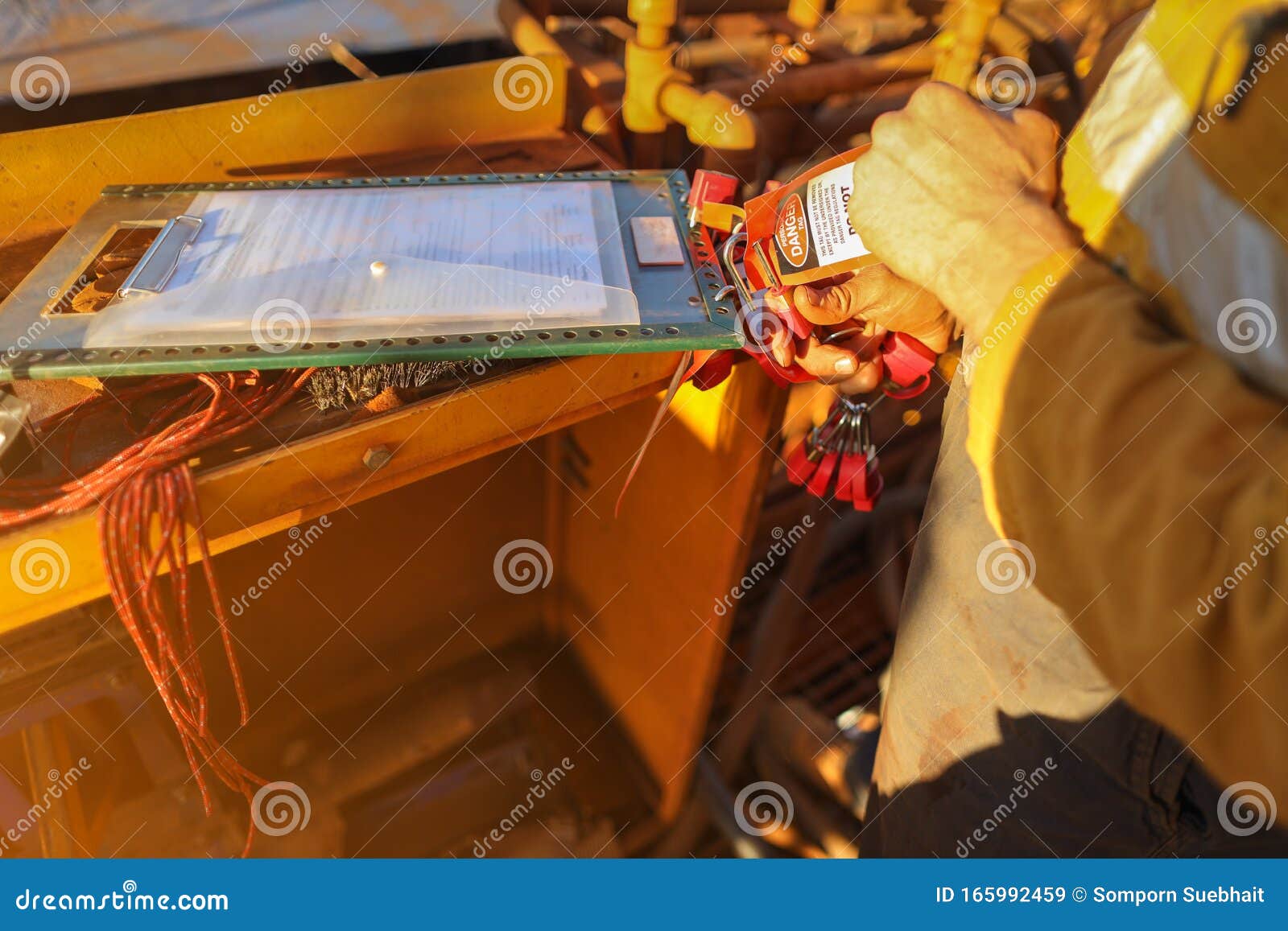 Construction Miner Placing Personal Red Danger Lock Which is Attached ...