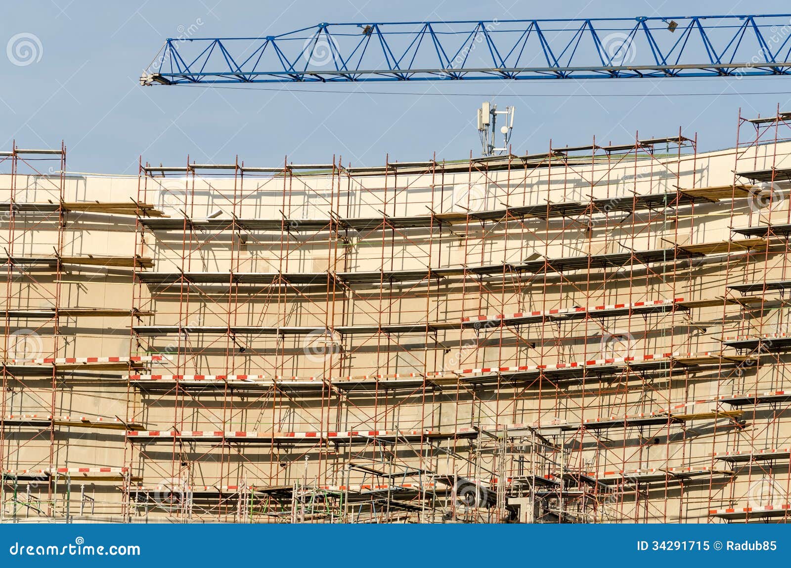 Construction of a Modern Building with Scaffolds and Crane Stock Image ...