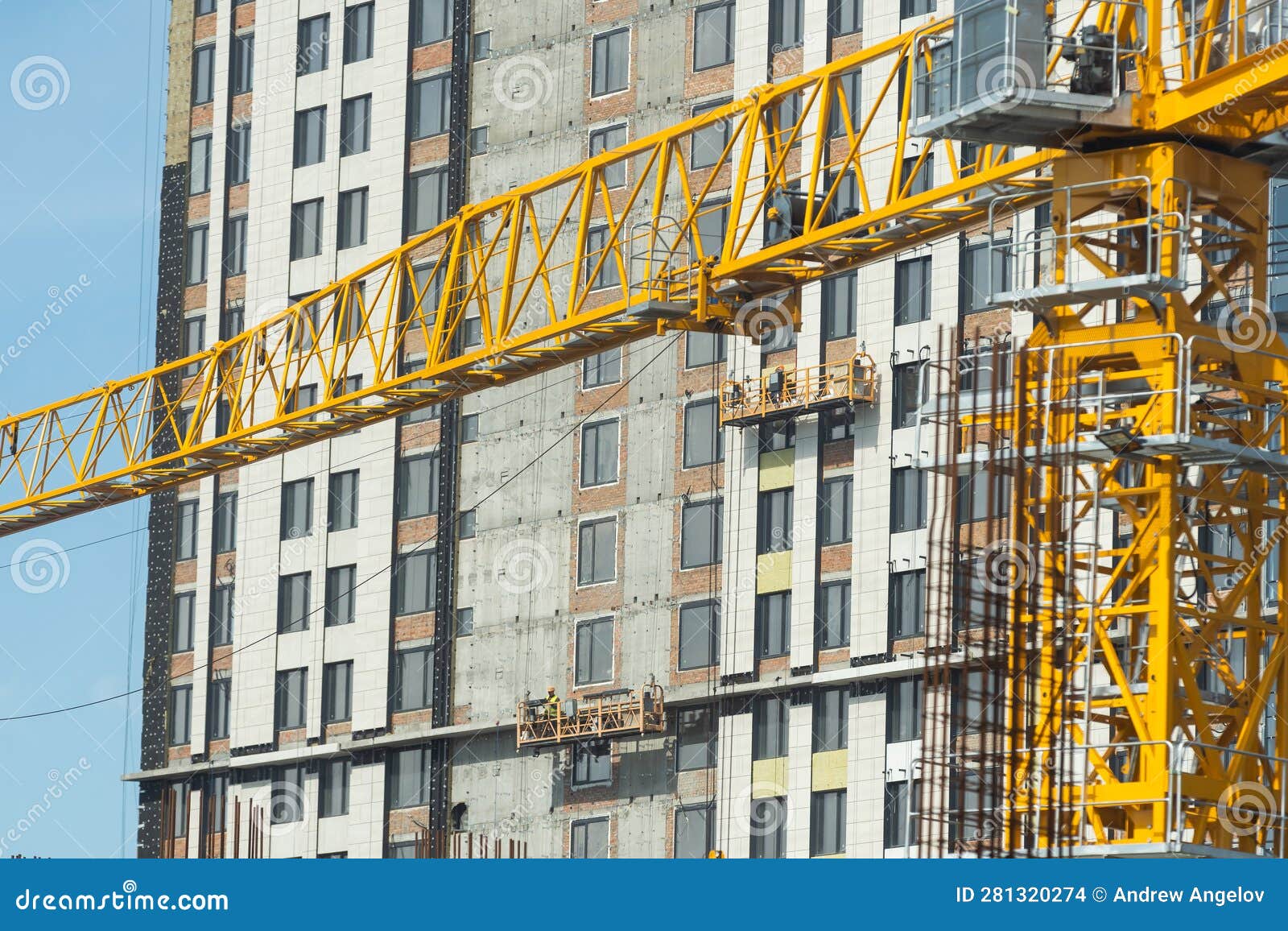 Construction of Modern Multi-storey Buildings. Workers in the ... Construction of Modern Multi-storey Buildings. Workers in the ...