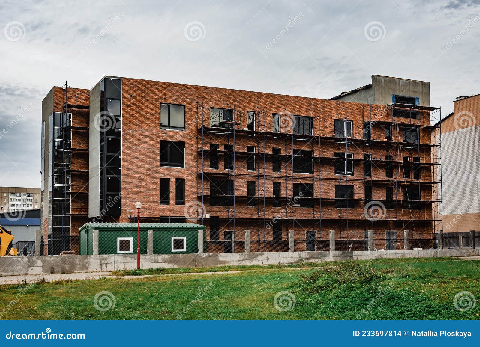 Construction of a Multi-storey Building with Scaffolding. Construction ...