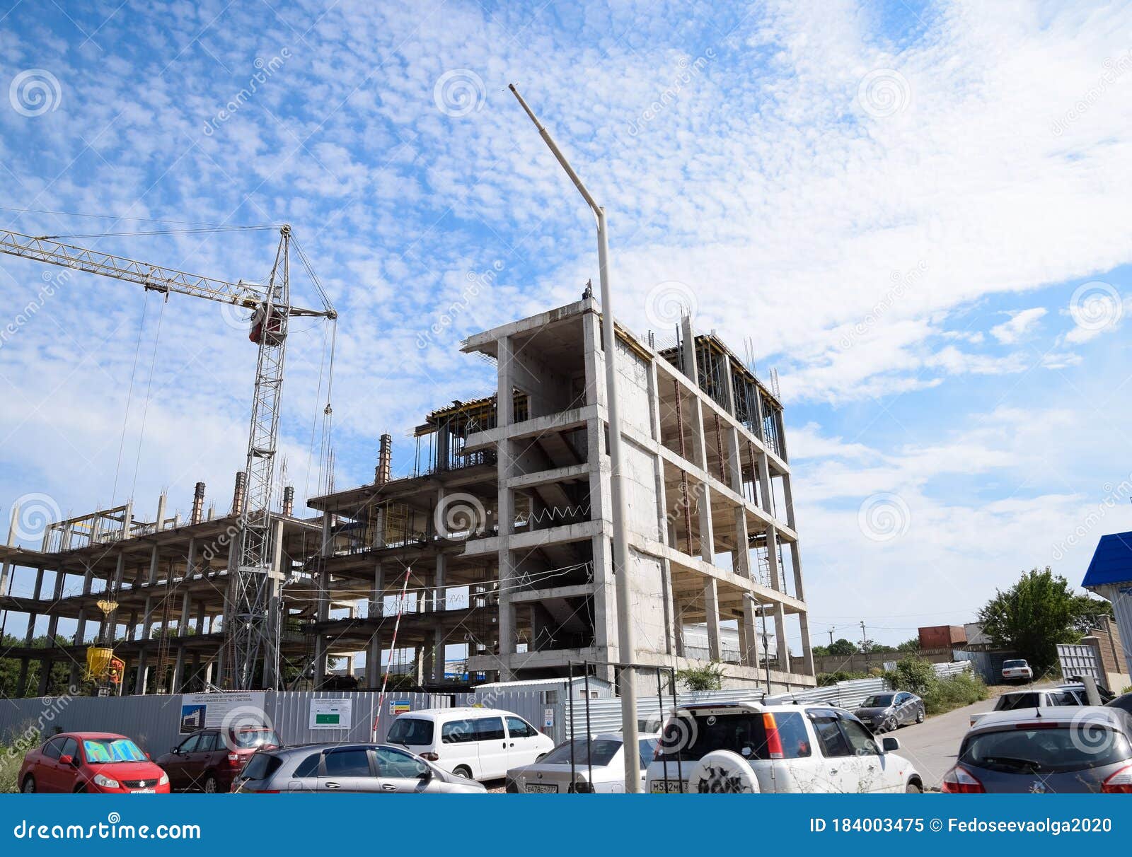 Construction of Multi Storey Residential Buildings. Tower Cranes at a ...