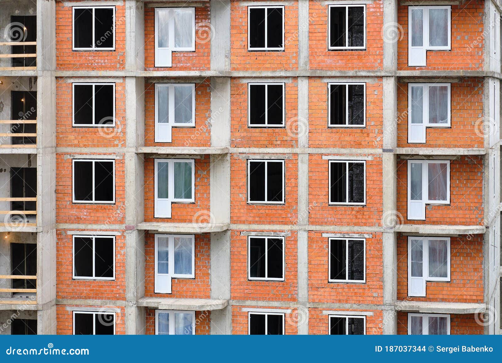 Construction of a New Brick Residential Building with an Inset of ...