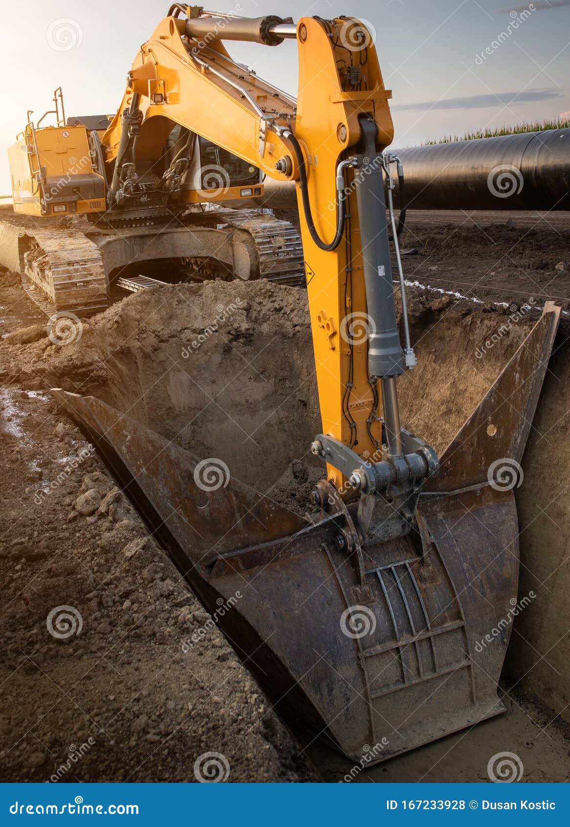 Crane Digging a Channel for Gas Pipeline Stock Photo - Image of ditch ...