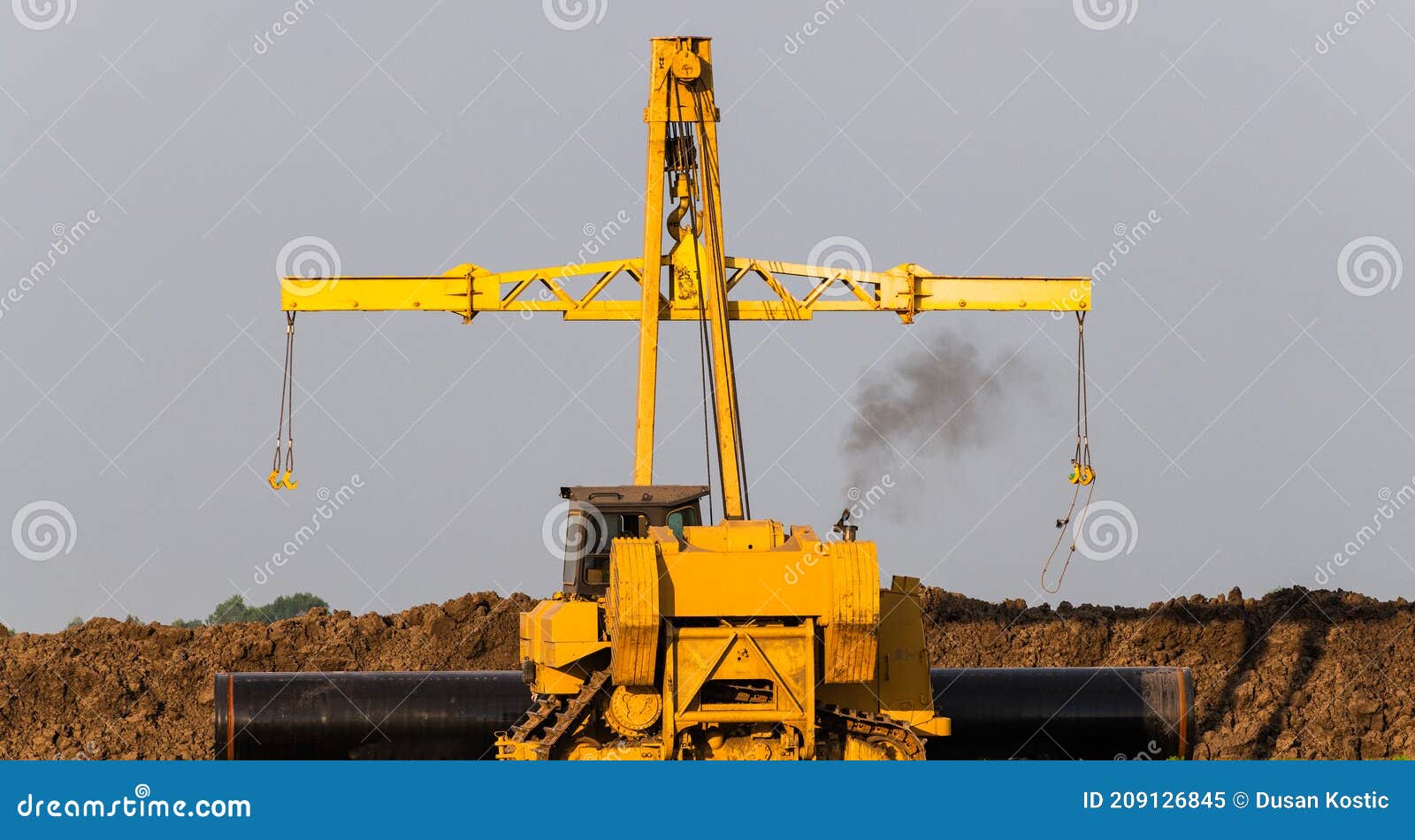 Crane Digging a Channel for Gas Pipeline Stock Image - Image of site ...