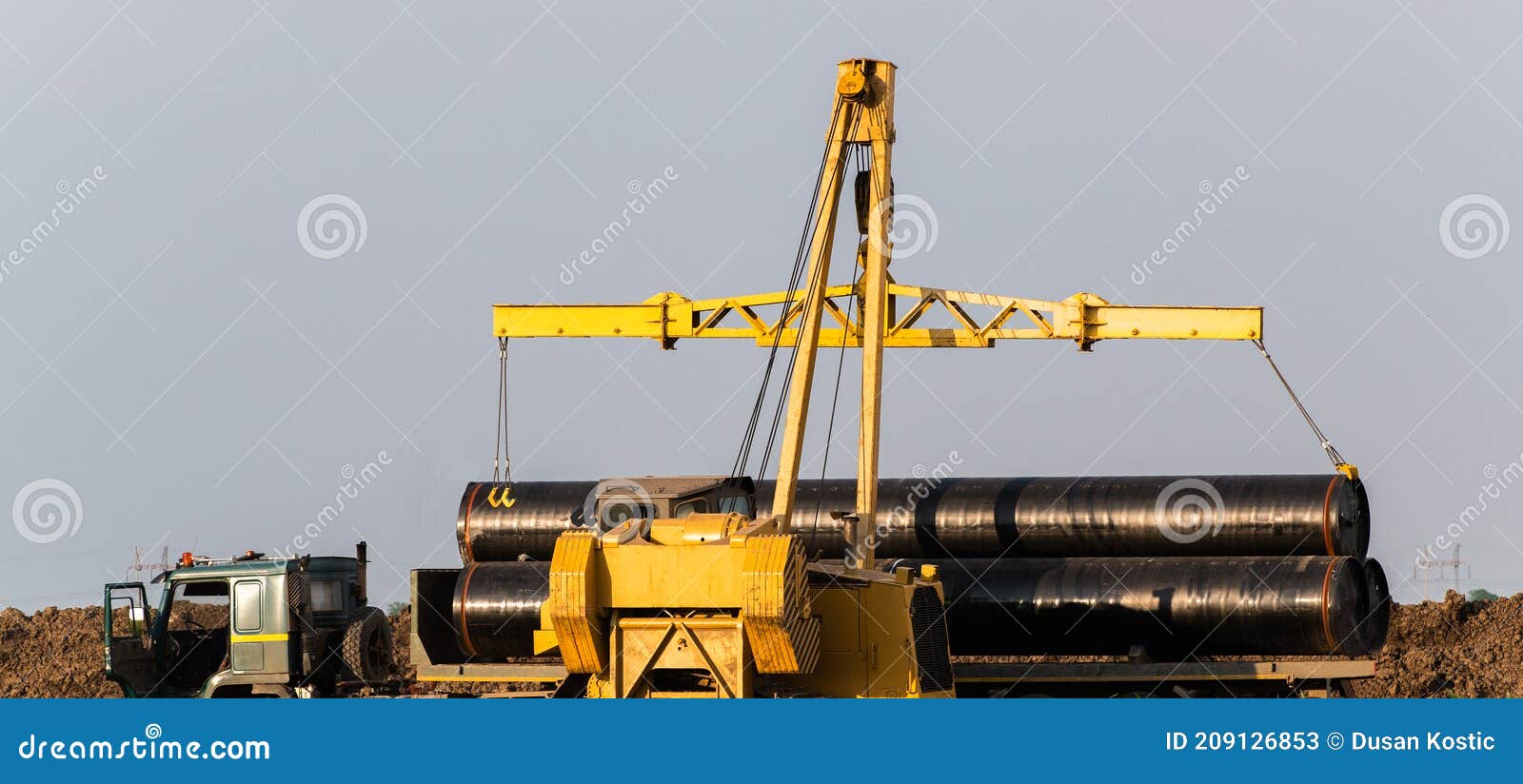 Crane Digging a Channel for Gas Pipeline Stock Image - Image of ...