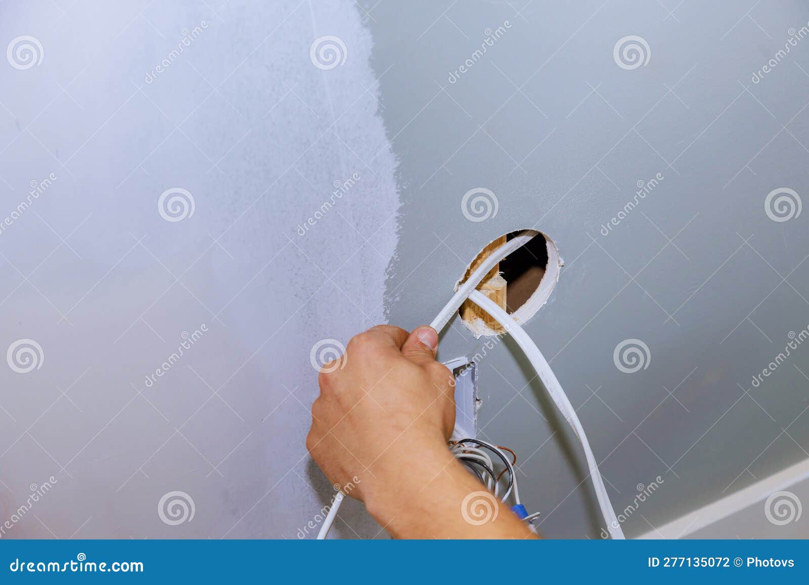 During the Construction of a New House, a Worker is Installing a New ...