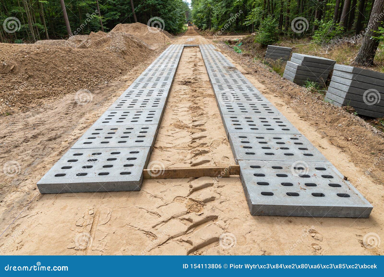 Construction of a New Road from Concrete Slabs. Setting a New Route in ...