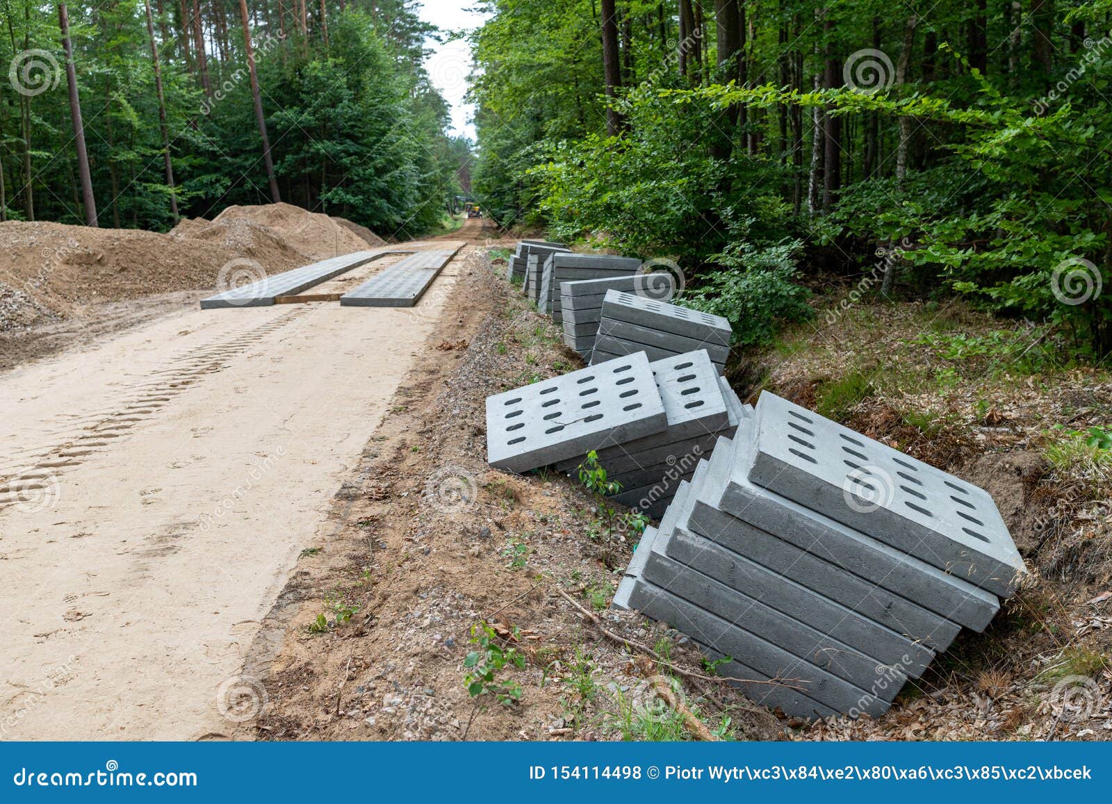 Construction of a New Road from Concrete Slabs. Setting a New Route in ...