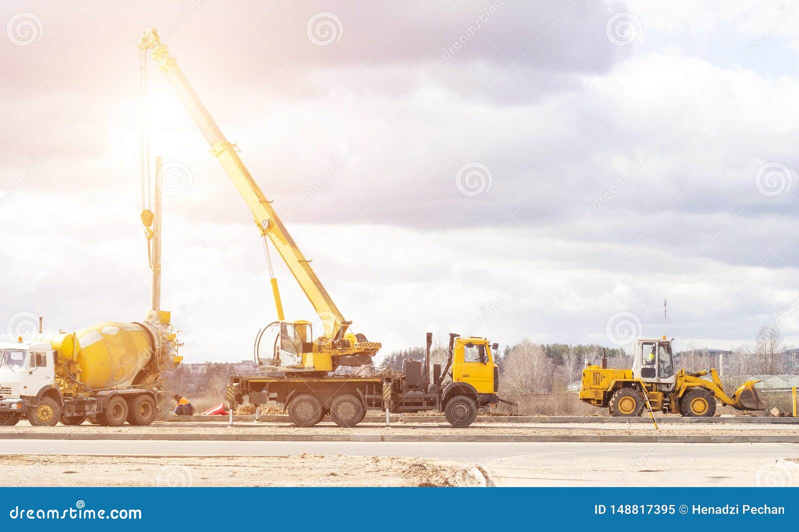 Construction of a New Road and Installation of Lampposts Using a Truck ...