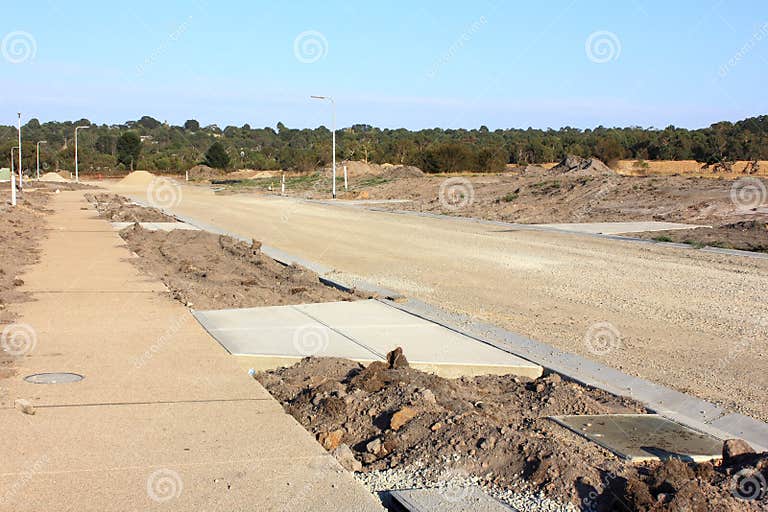 Construction of New Road in Subdivision Stock Image - Image of ...