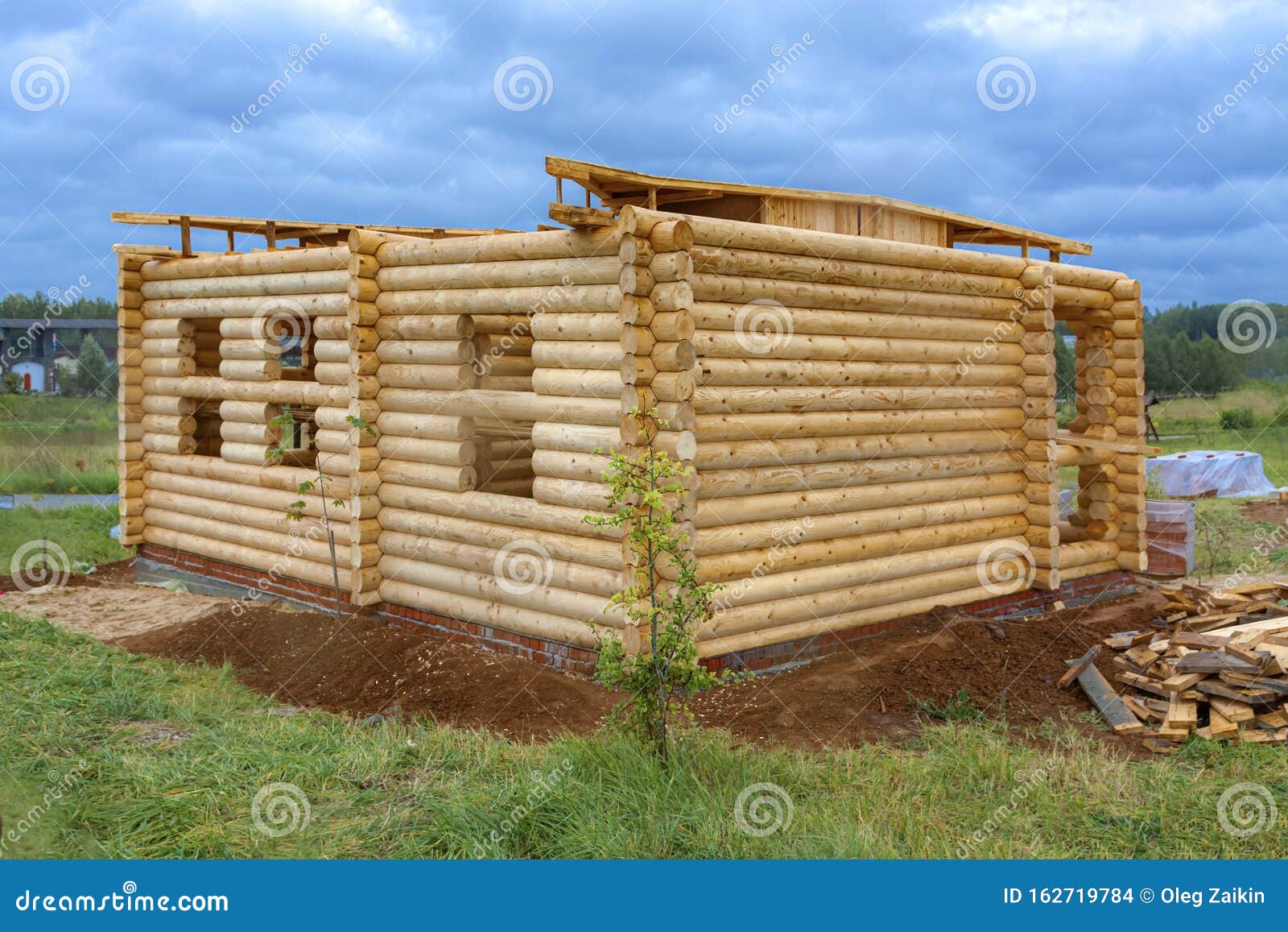 Construction of a New, Small Wooden Log House Stock Photo - Image of ...