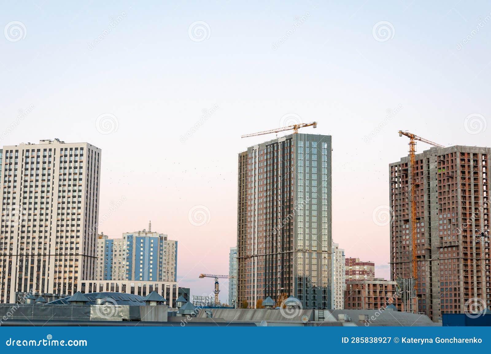 Construction Od Building. Industrial Crane at Construction Site ...