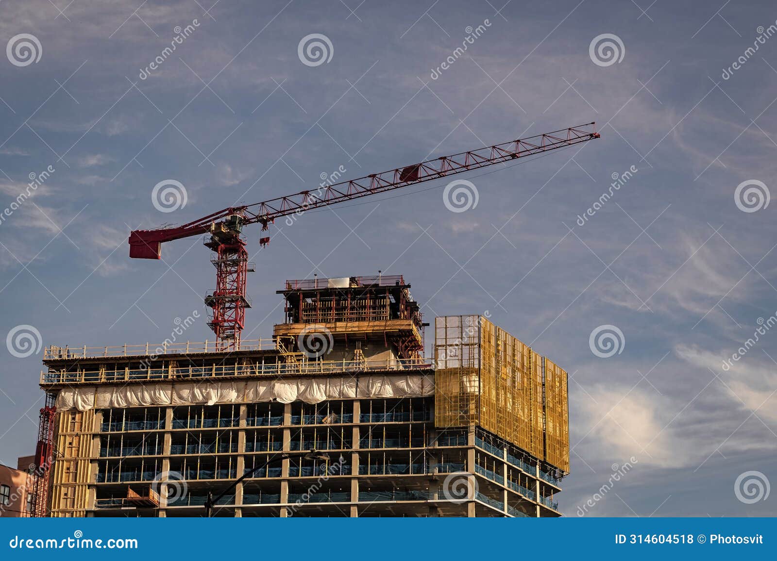 Construction Od Building. Industrial Crane at Construction Site ...