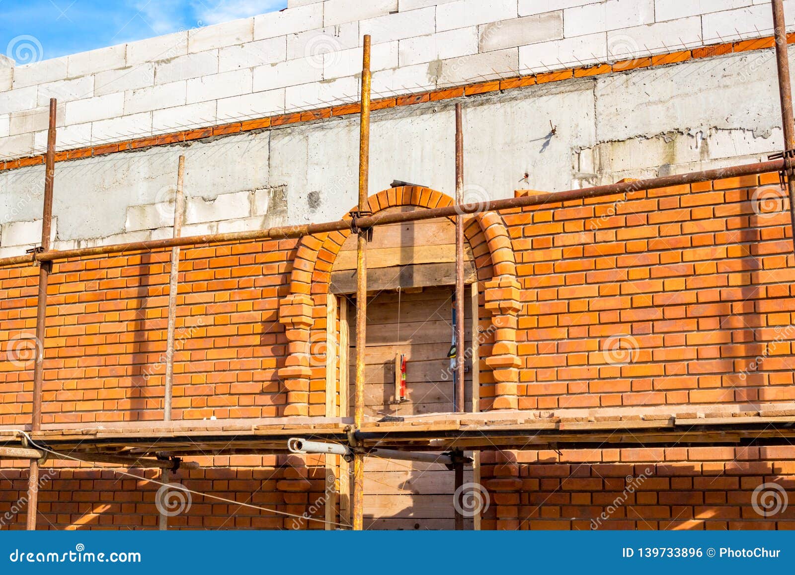Construction of an Old-style Building with Arched Windows Stock Photo ...
