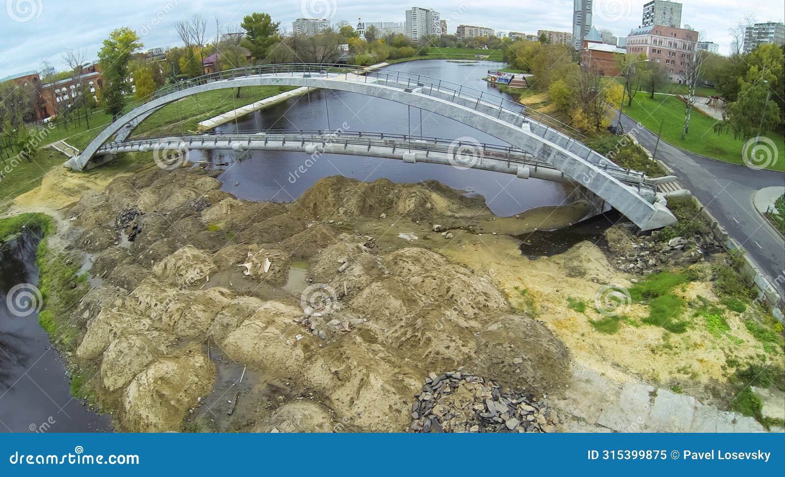 Construction of the Pedestrian Arch Bridge Over a Stock Image - Image ...