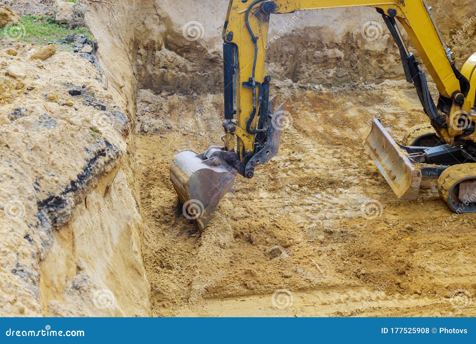 Excavator At Earthworks On Construction Site. Backhoe Loader Digs A Pit ...