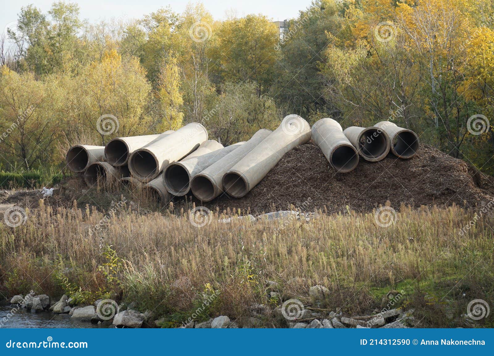 Construction Pipes are Stacked on the Grass Stock Photo - Image of ...