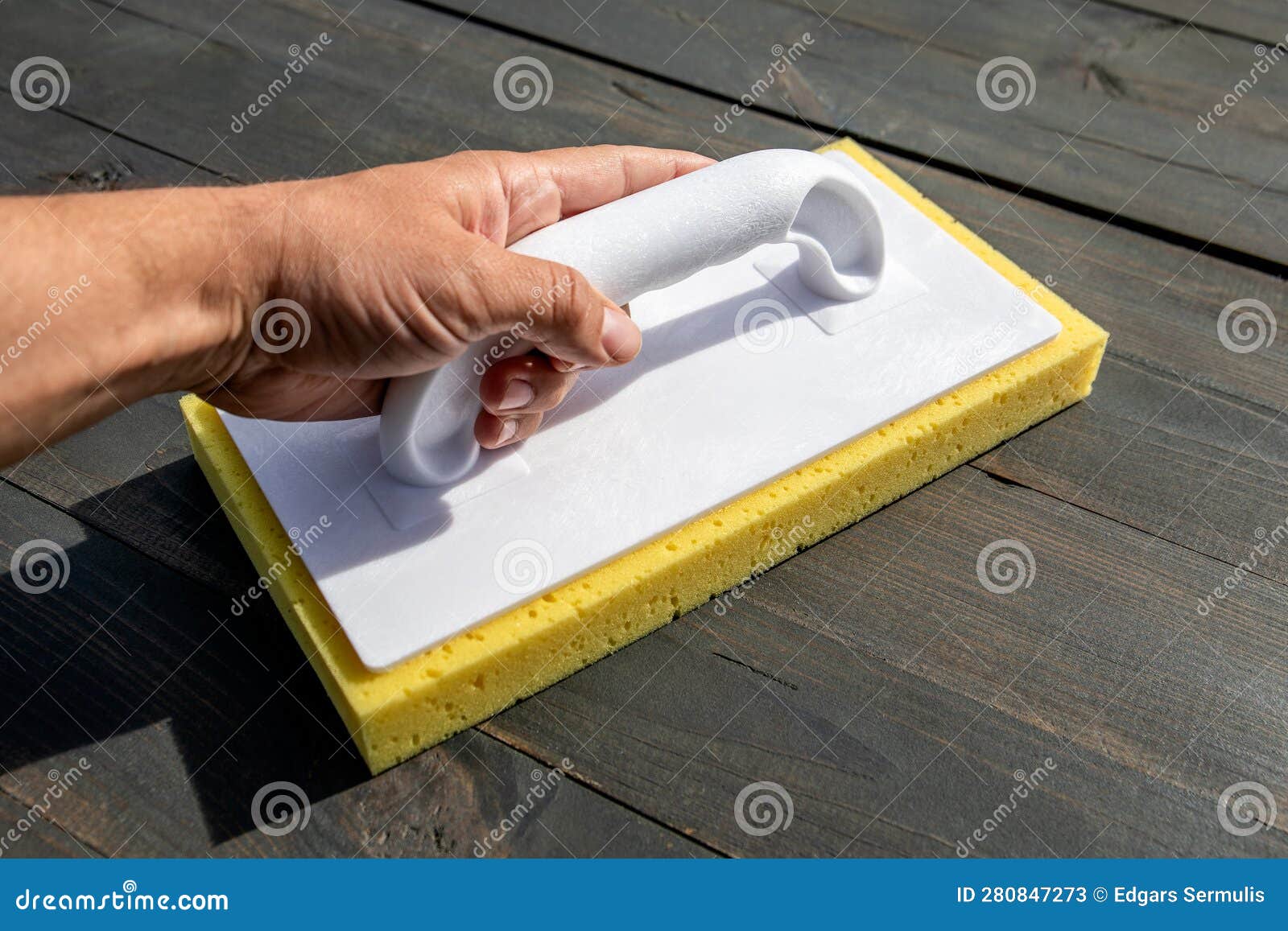 Construction Planer with a Sponge in a Man& X27;s Hand. Wood Texture ...