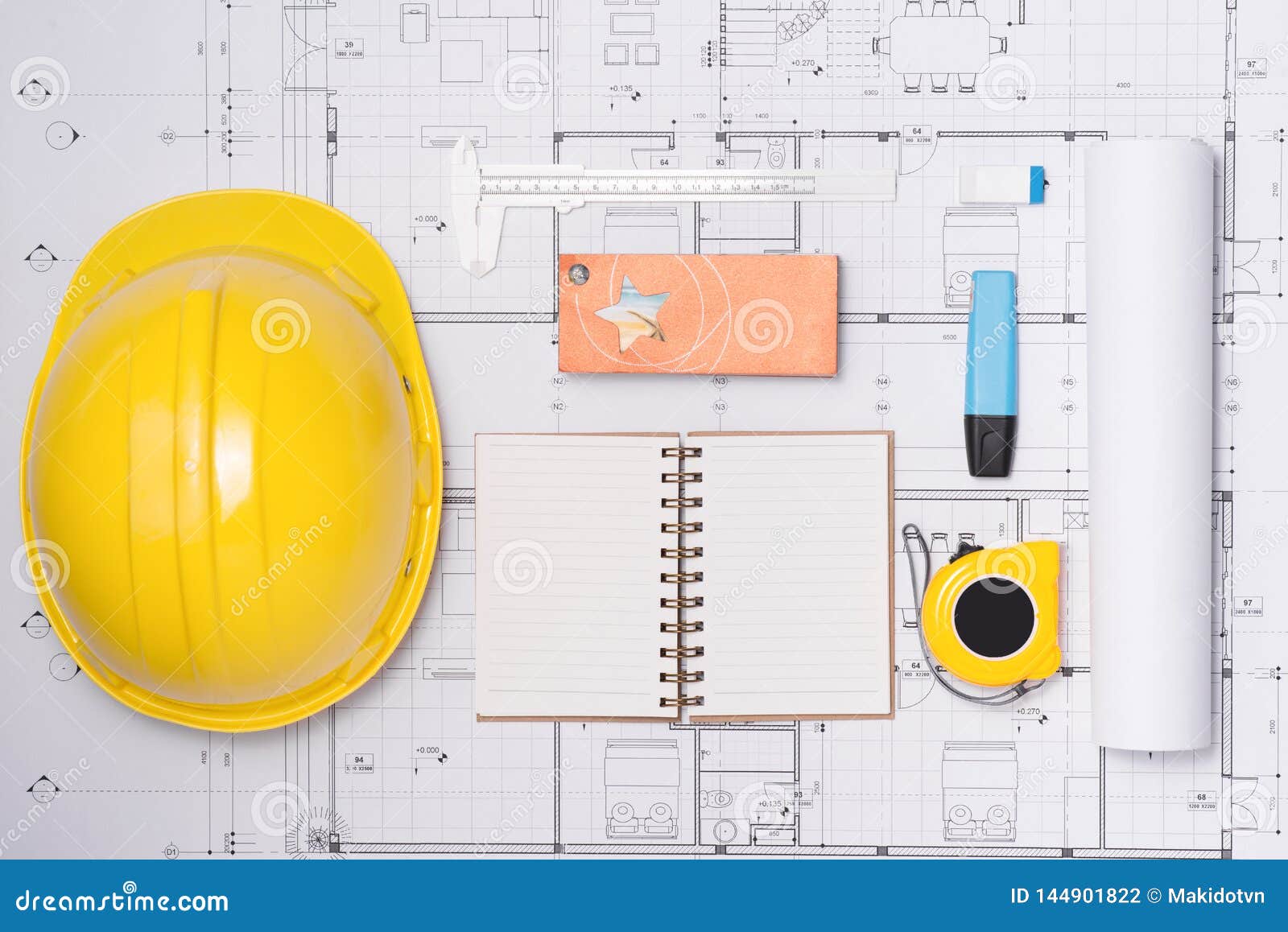 Construction Plans with Helmet and Drawing Tools on Blueprints Stock ...